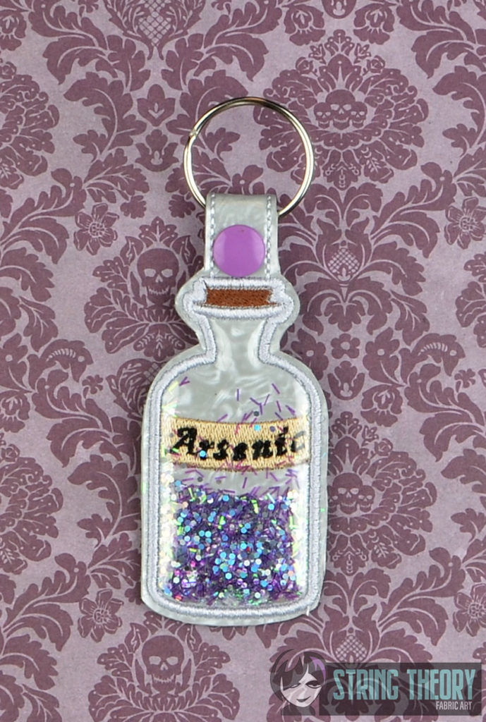 Arsenic Poison Bottle Trapped Snap Tab Key Fob – String Theory Fabric Art