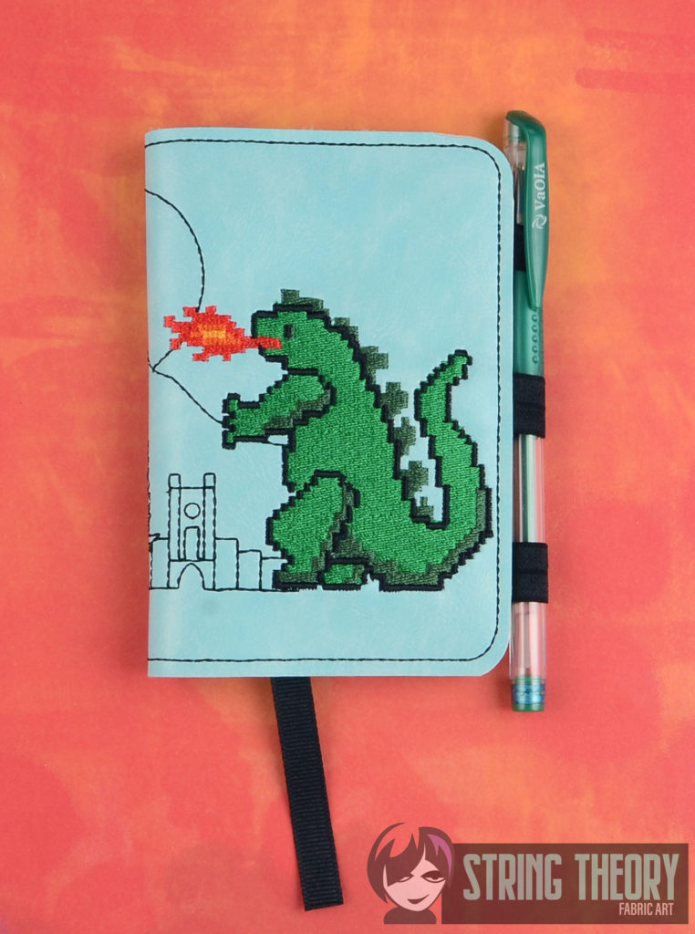 8 Bit Godzilla Notebook Cover – String Theory Fabric Art