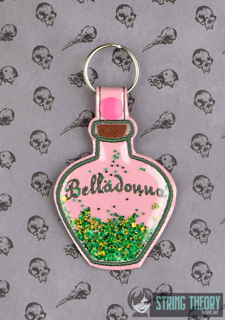 Belladonna poison bottle Trapped Snap Tab Key Fob – String Theory ...