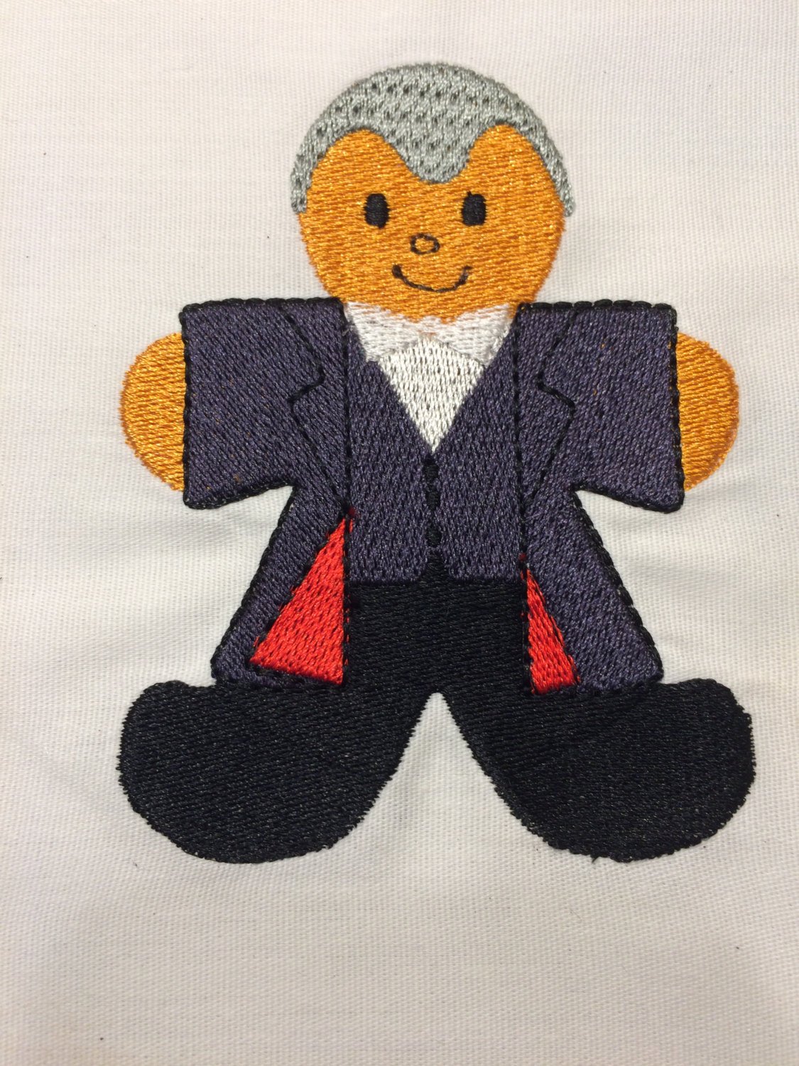Dr. Space 12th Doctor Gingerbread Man – String Theory Fabric Art