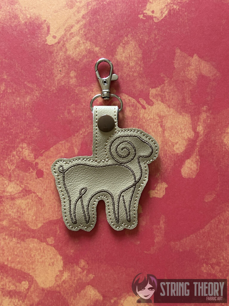 Continuous Line Ram fob – String Theory Fabric Art