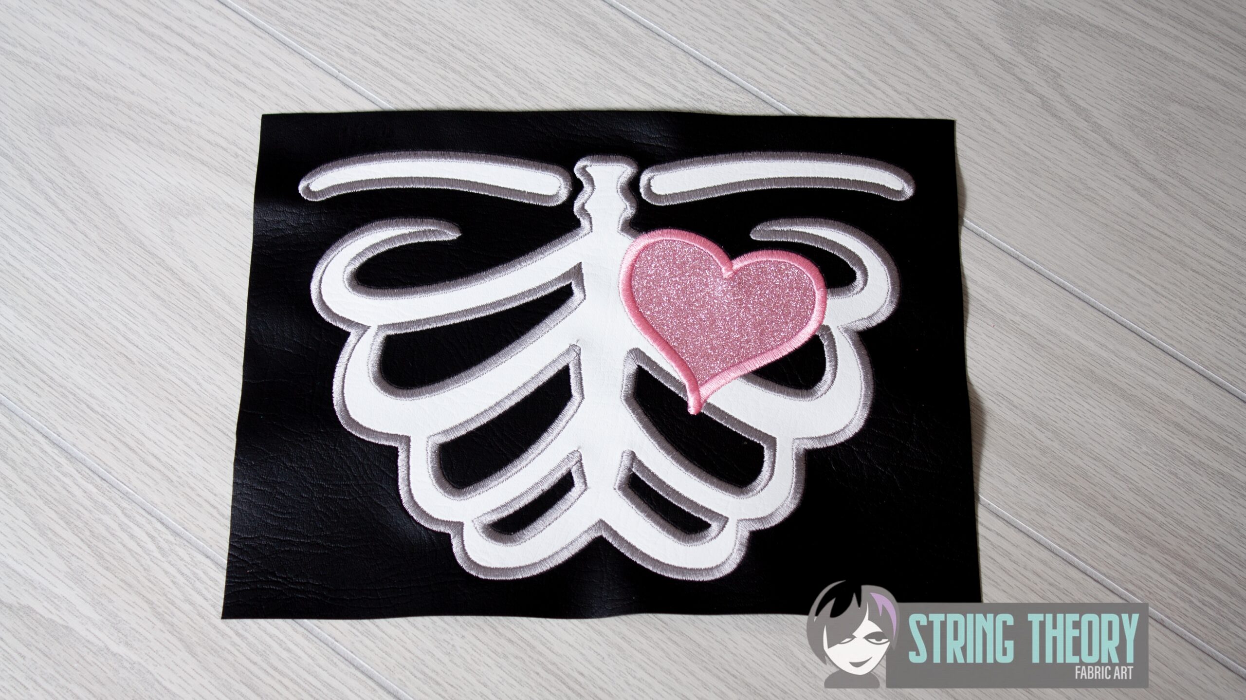 Chibi Rib Cage Appliqué – String Theory Fabric Art